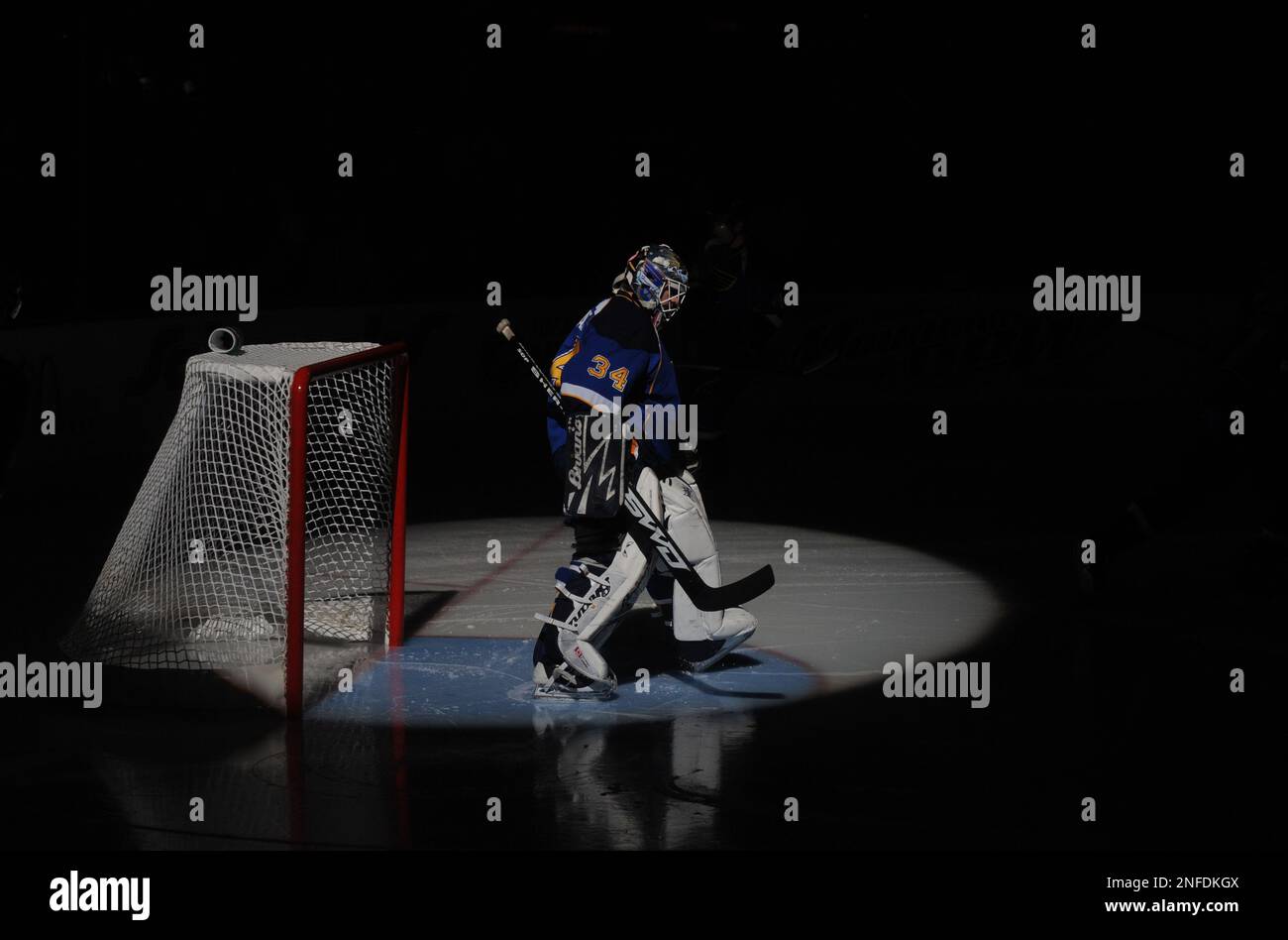 St. Louis Blues' Manny Legace stands for the National Anthem prior to ...