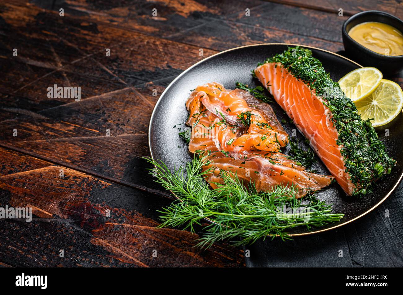 Cured Salmon fillet with dill, salt and papper, gravlax. Wooden ...