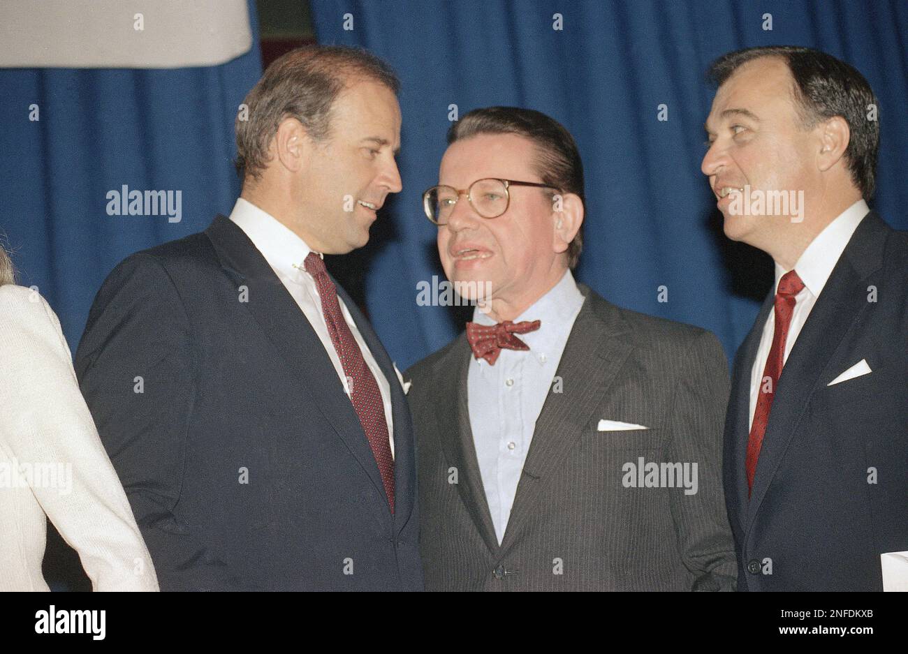 Sen. Joseph Biden, D-Del., left, talks with Sen. Paul Simon, D-Ill ...