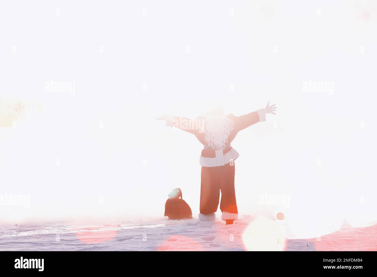 Santa in the winter field. Santa magical fog walking along the field ...