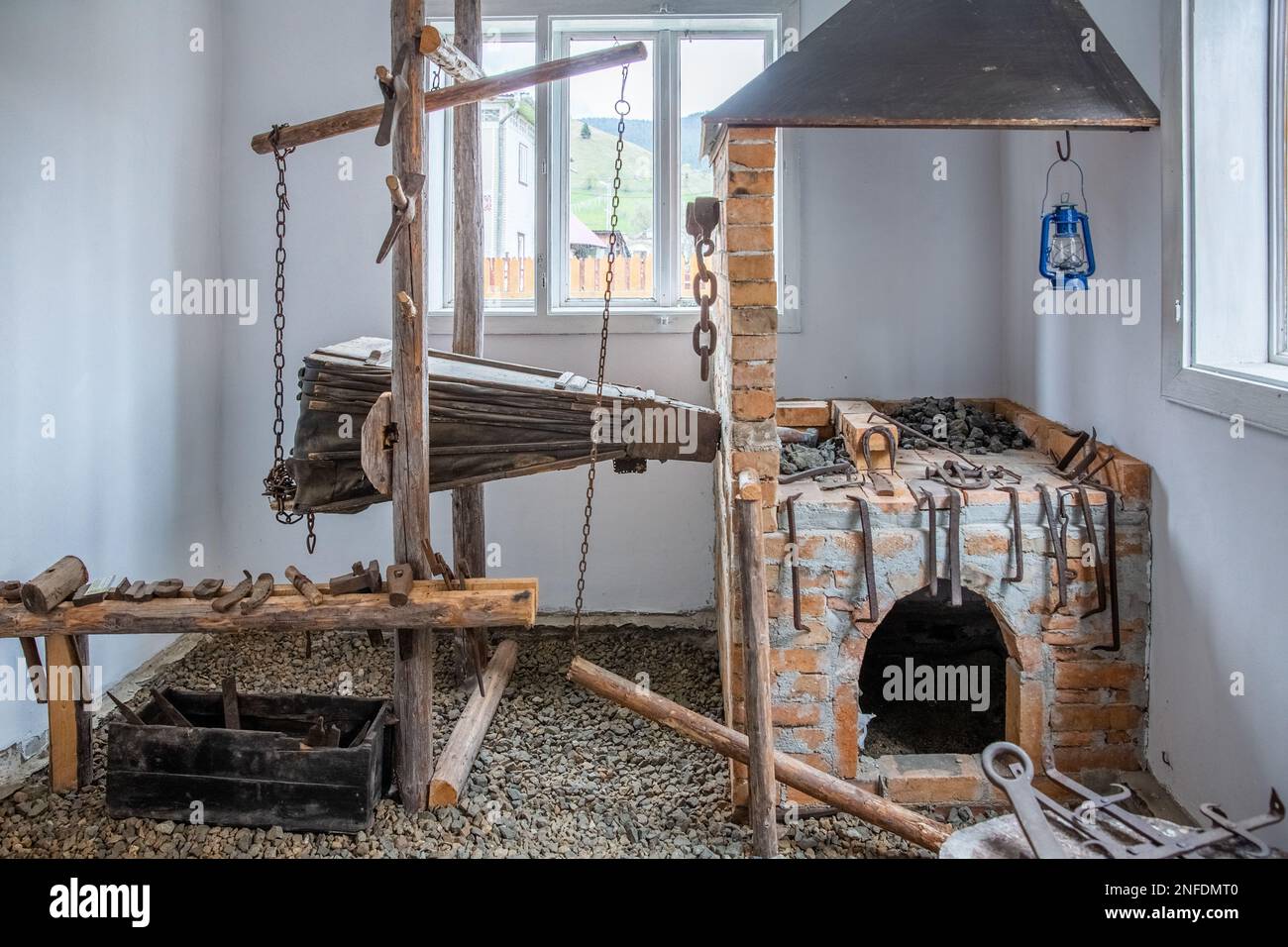 A closeup shot of old iron medieval equipment in the white room Stock ...