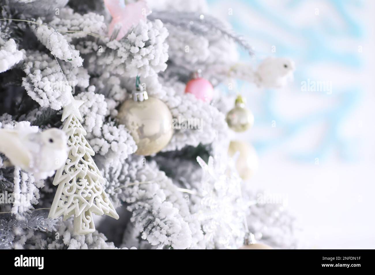 Christmas holiday background. Silver and red bauble hanging from a ...