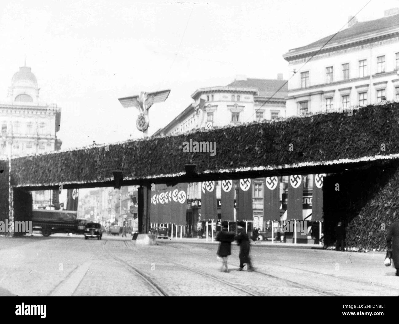 Nazi flags and emblems decorate the street in Vienna, Austria, March 17 ...