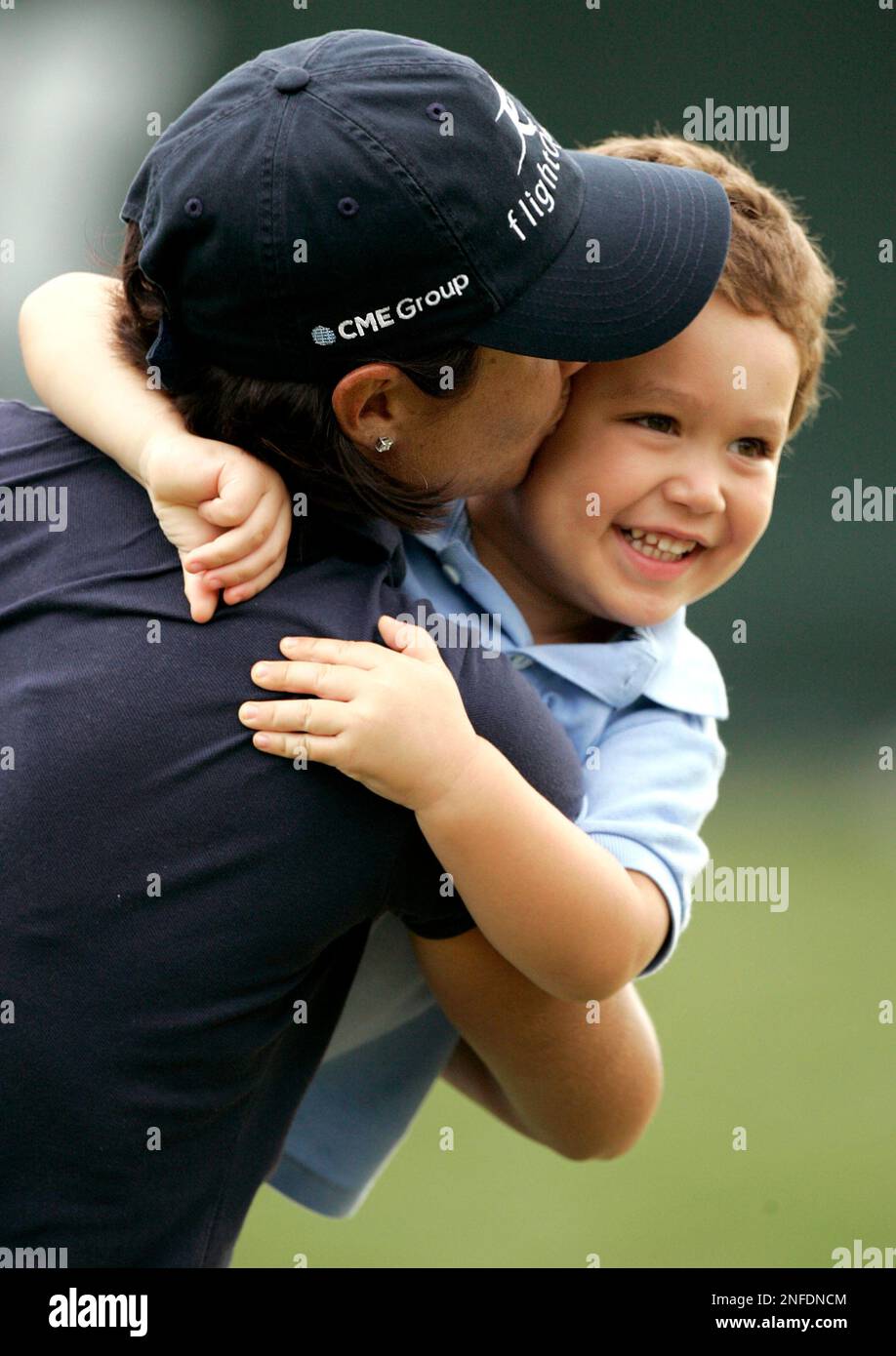 Cooper Diaz, 2, jumps into his mom, Laura Diaz's, arms after she ...