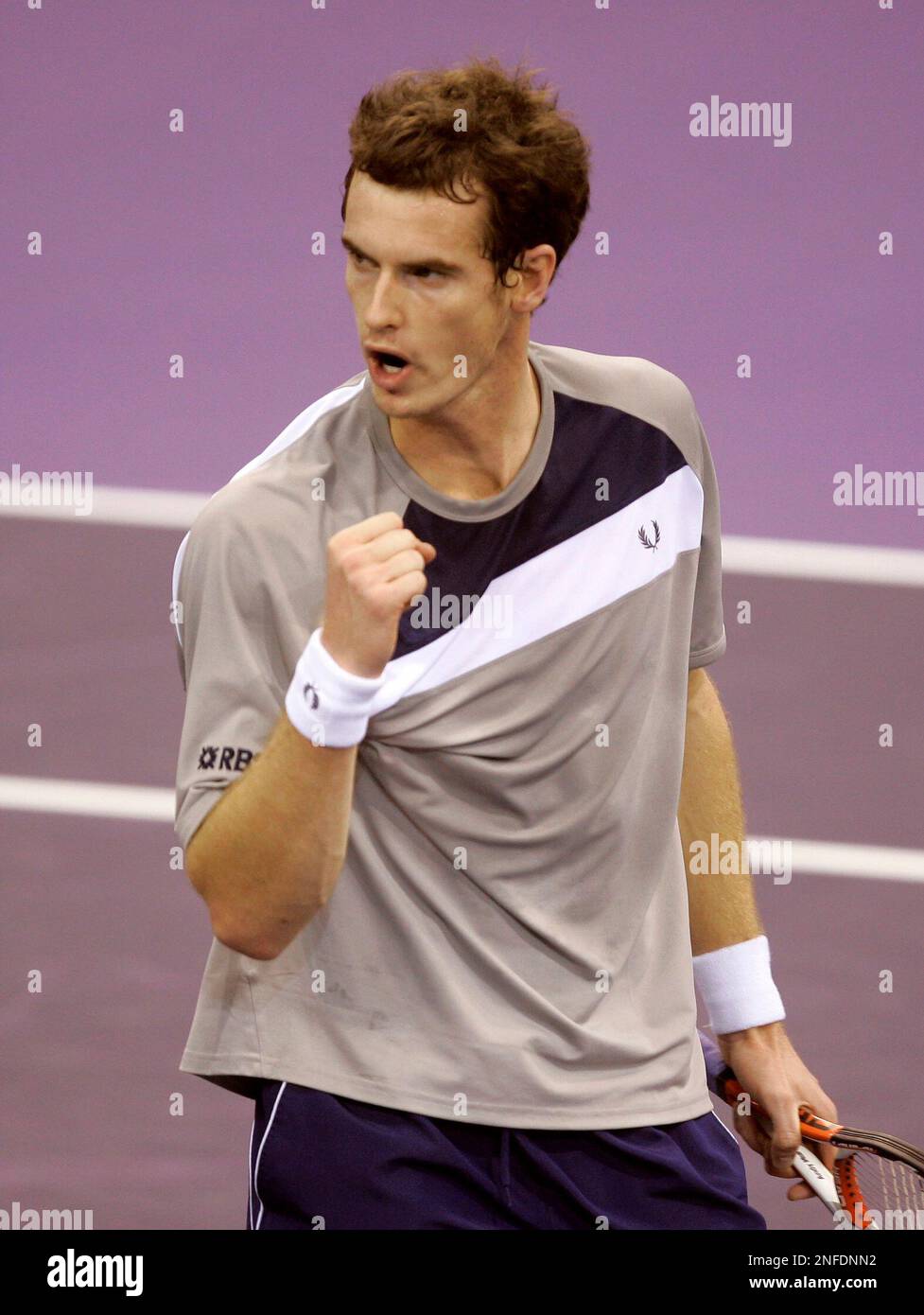 Britain's Andy Murray reacts after winning the first set during the ...
