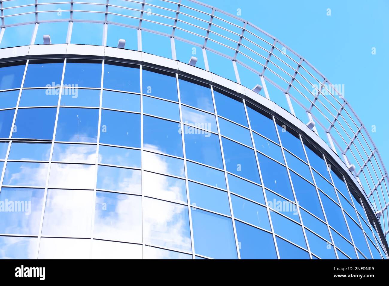 Architectural detail of the facade with multiple reflections of other ...