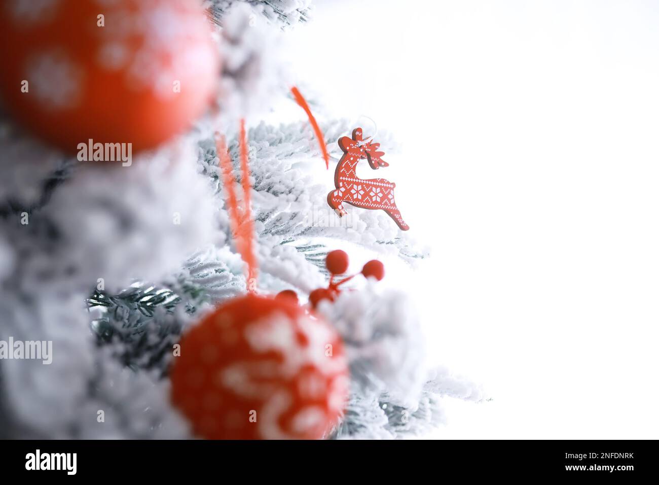 Christmas holiday background. Silver and red bauble hanging from a ...