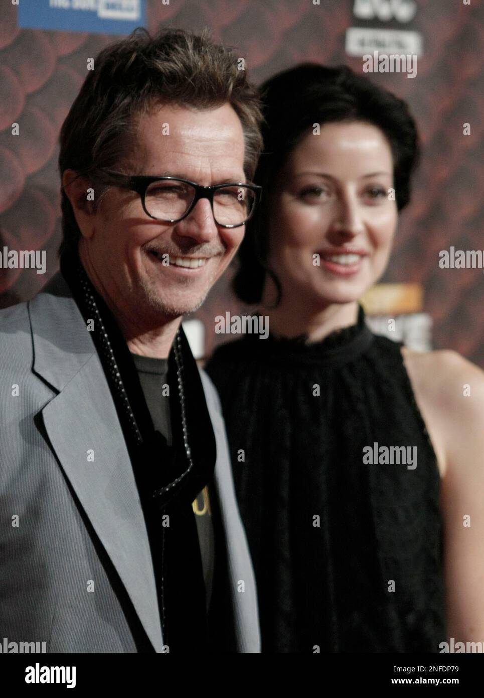 Gary Oldman and guest arrive at the Scream Awards on Saturday Oct. 18 ...