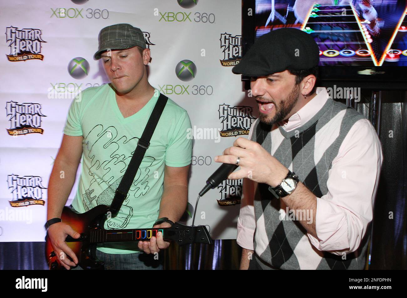 Heath Burgett and Sean Gerrity rock out on the new Guitar Hero World ...