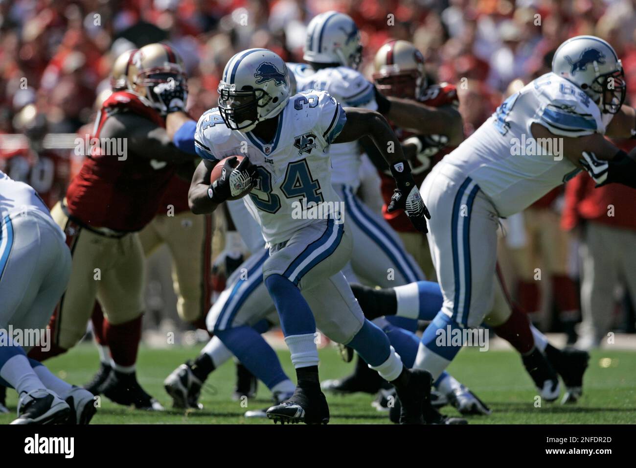 Detroit Lions running back Kevin Smith runs for yardage in an NFL ...