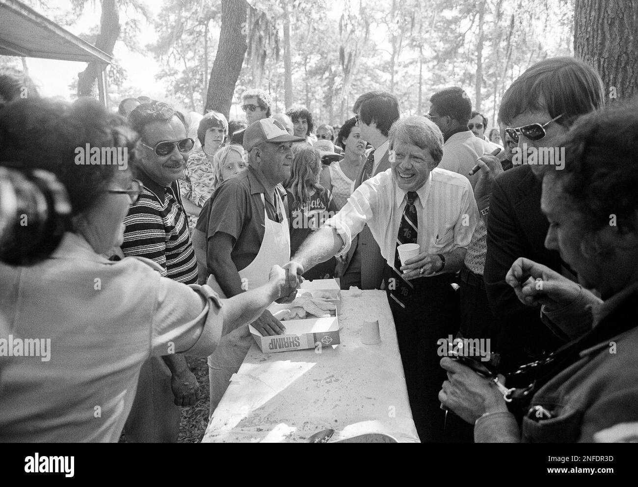 Jimmy Carter, right, Democratic presidential candidate, shakes hands ...