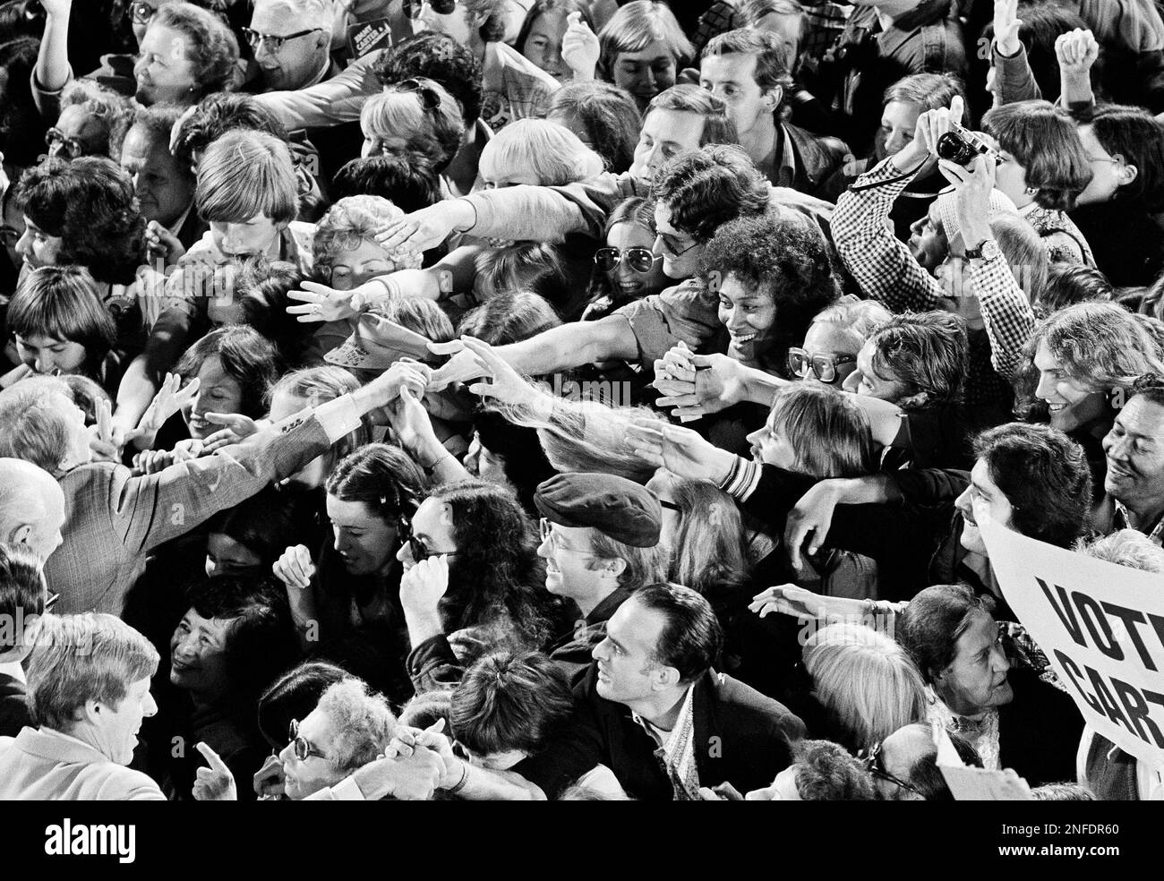In Ghirardelli Square, San Francisco, the crowd surges forward as ...