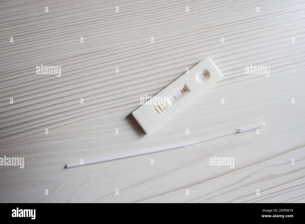 Positive SARS Covid antigen test kit, rapid test, saliva swab, box with ...