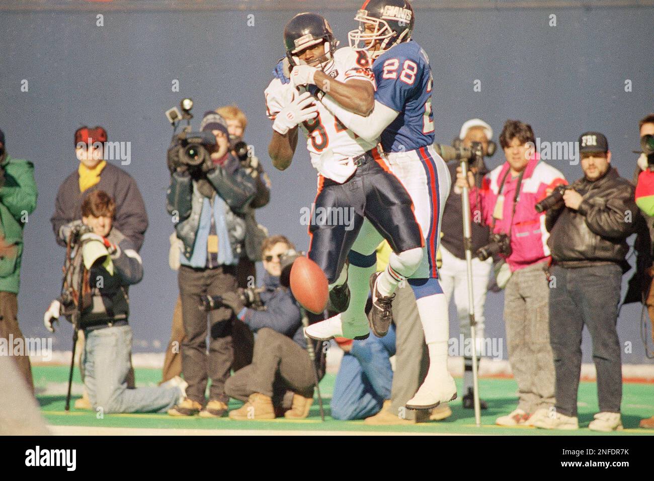Everson Walls of the New York Giants breaks up a pass to Ron Morris of ...