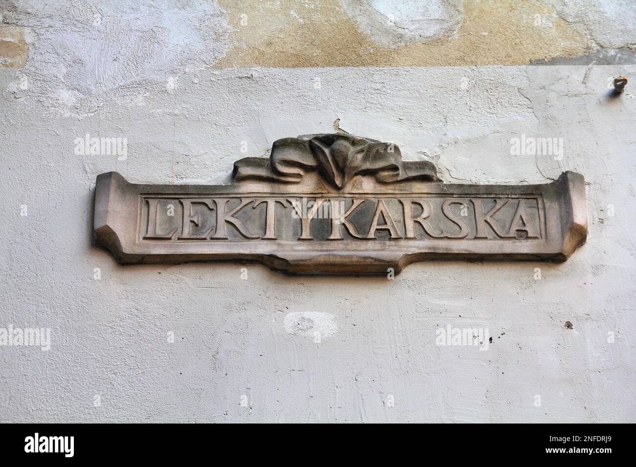 Gdansk city detail. Old street name sign: Lektykarska street in Gdansk ...