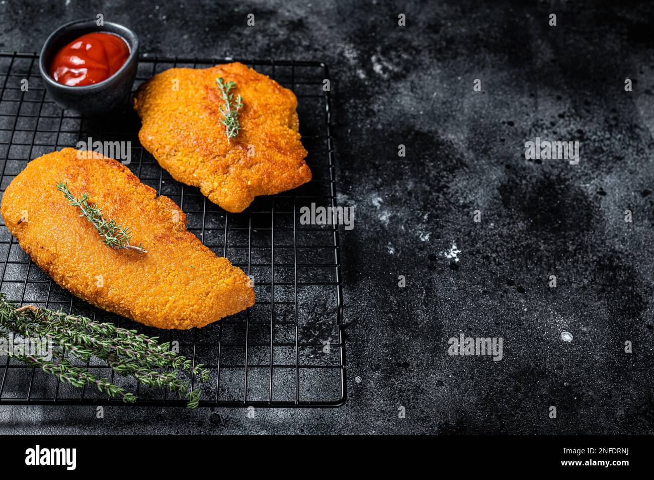 Fried Breaded weiner schnitzel, cooked meat steak. Black background ...