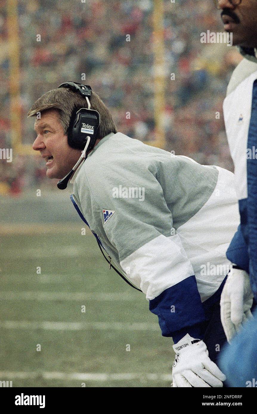Dallas Cowboys coach Jimmy Johnson watches the action from the ...