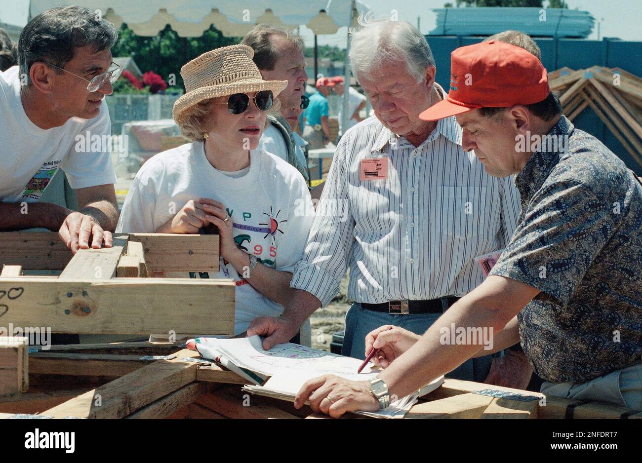 Former Pres. Jimmy Carter and his wife Rosalynn, stand between Millard ...
