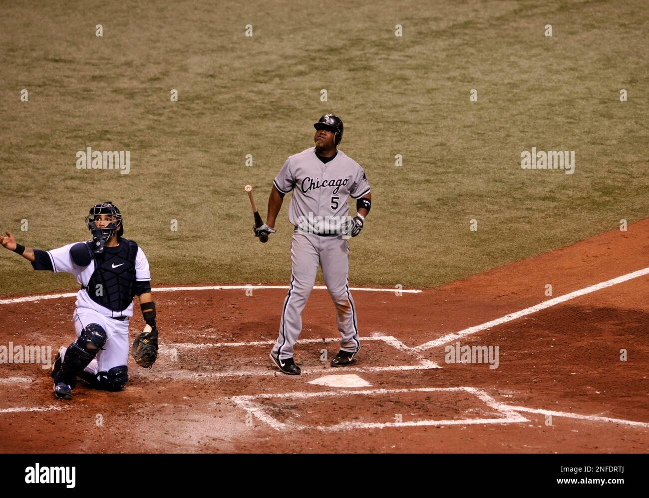 Chicago White Sox's Juan Uribe watches his ball at bat during the ...