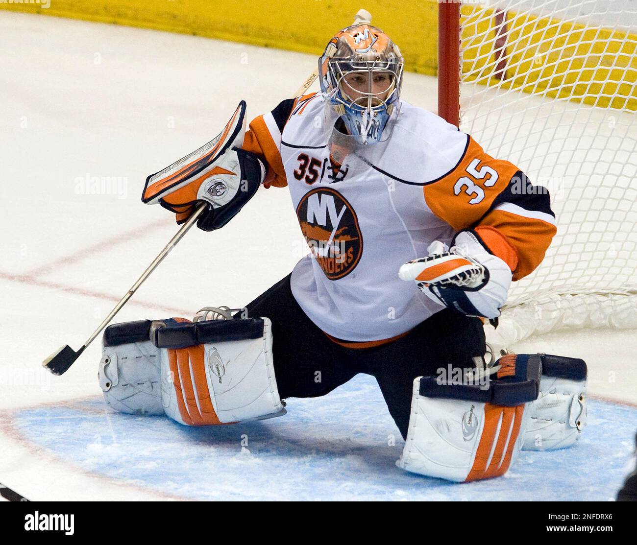 New York Islanders goalie Joey MacDonald (35) watches the puck during ...