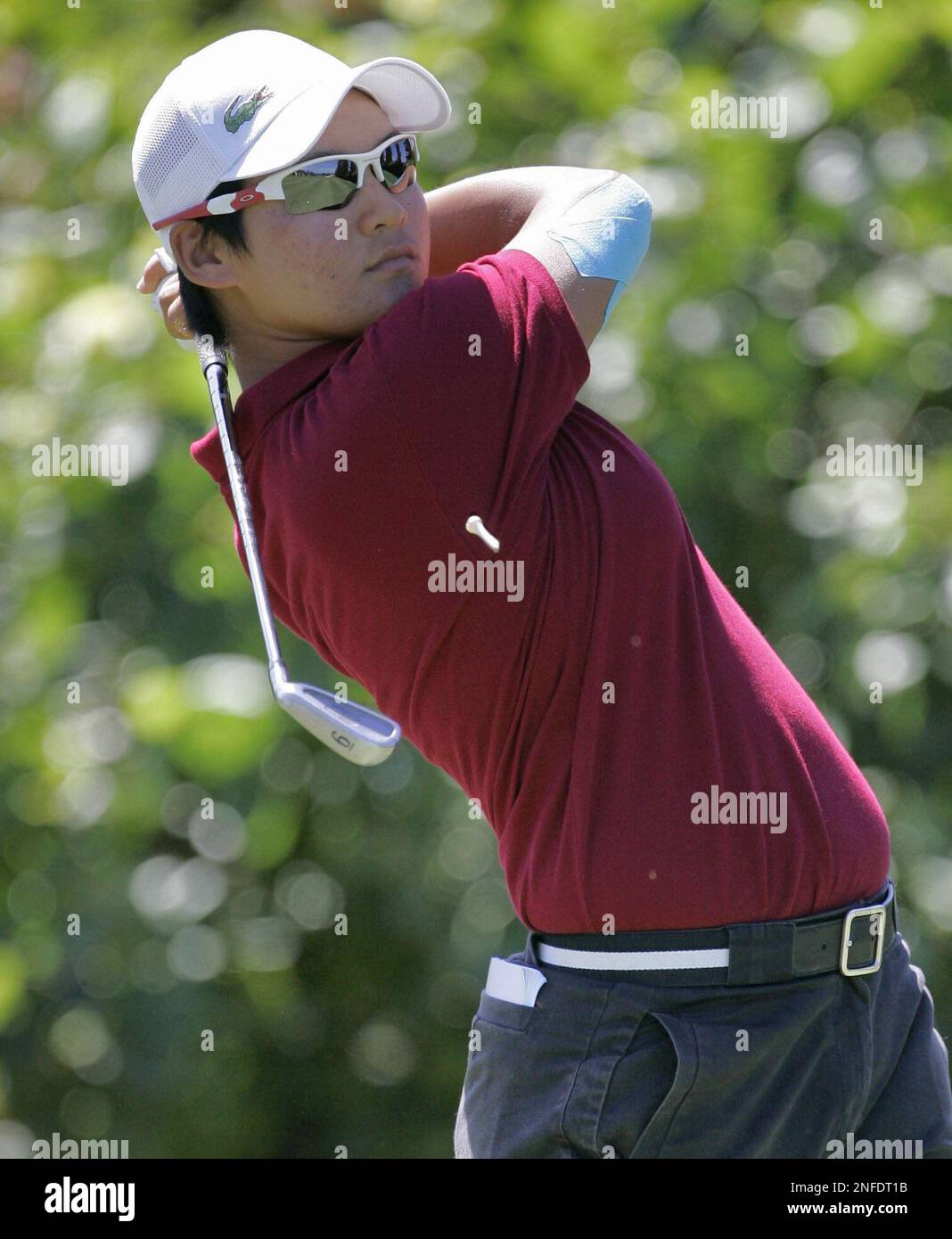 Yani Tseng, of Taiwan, hits from the third tee of Kapalua Resort during ...
