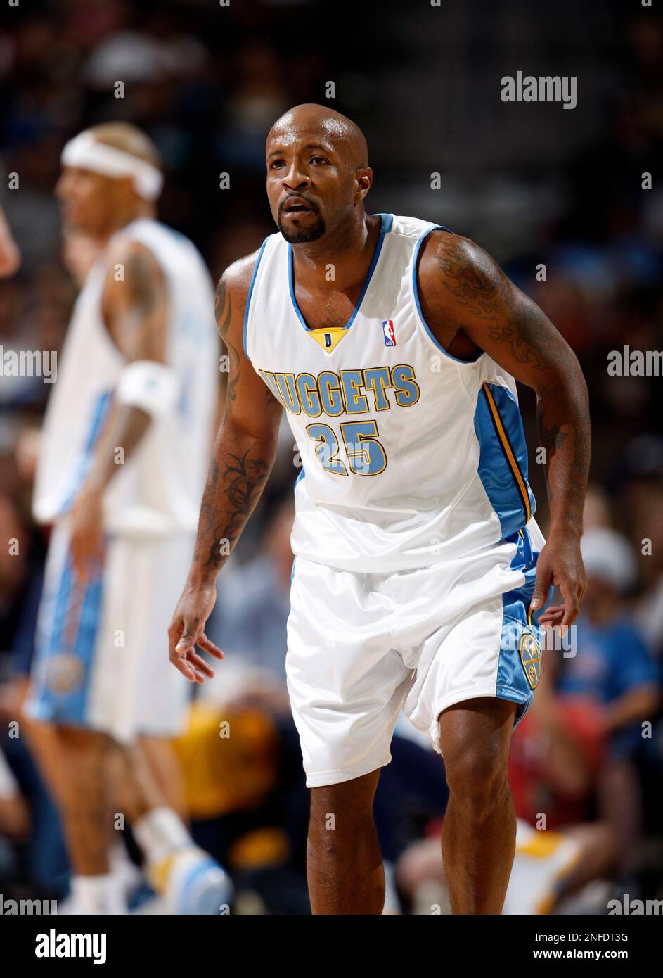 Denver Nuggets guard Anthony Carter drops back to play defense against ...