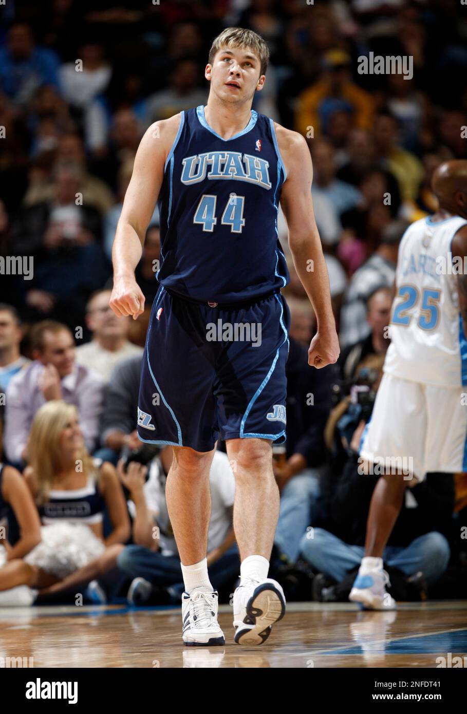 Utah Jazz center Kyrylo Fesenko, of the Ukraine, heads down the court ...