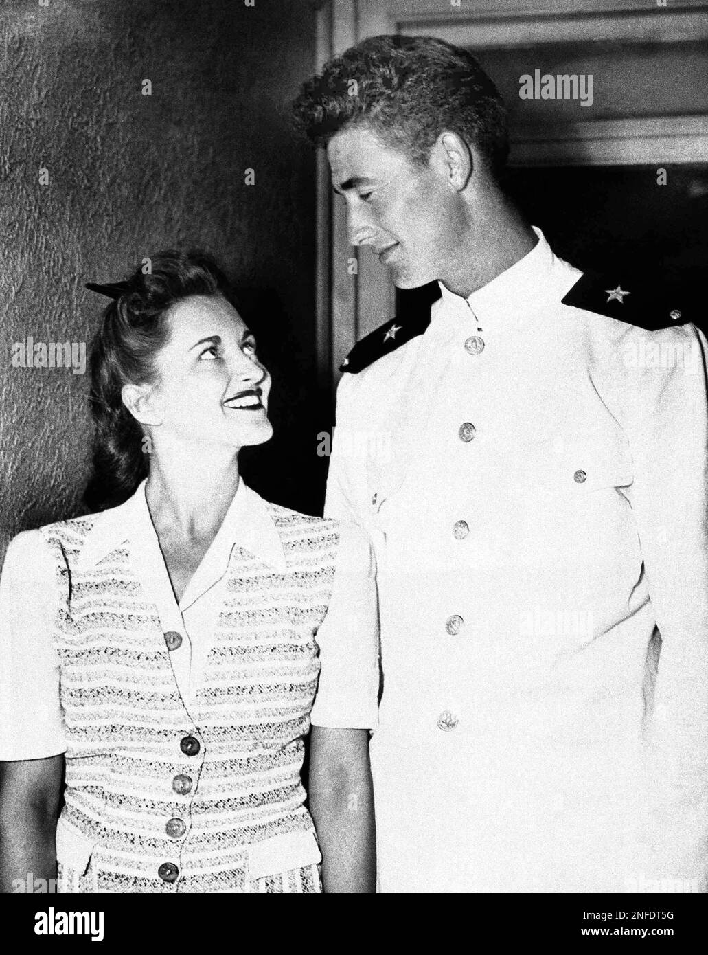 Naval air cadet Ted Williams, former Red Sox outfielder, looks down ...