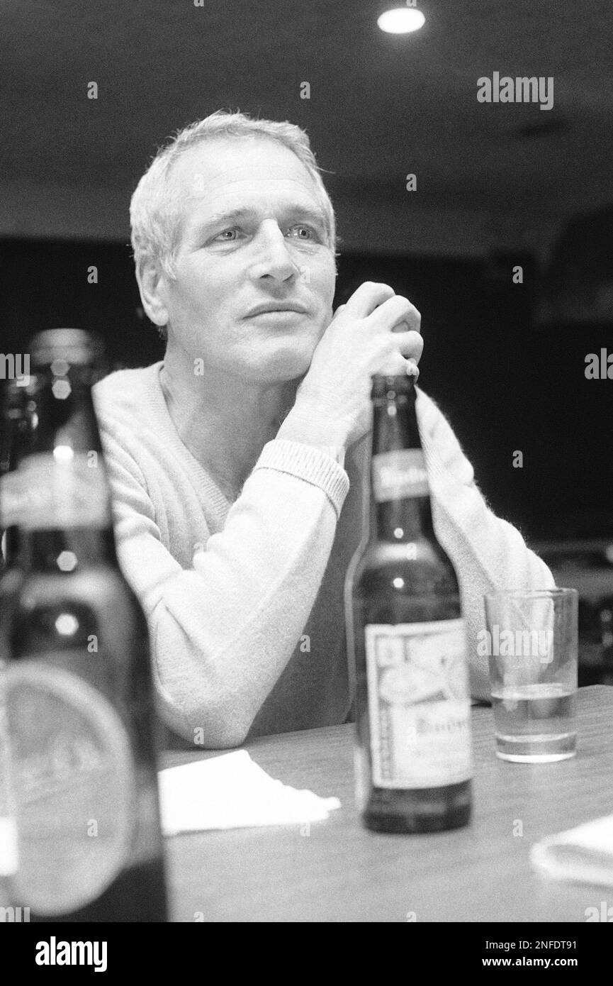 Actor Paul Newman has a beer during an interview at his Alma Mater ...
