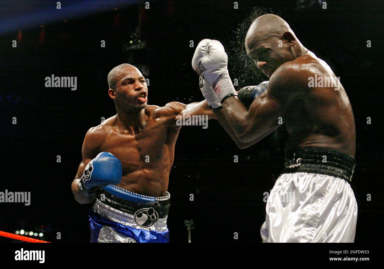 Chad Dawson (left) trades punches with Antonio Tarver during their IBF ...