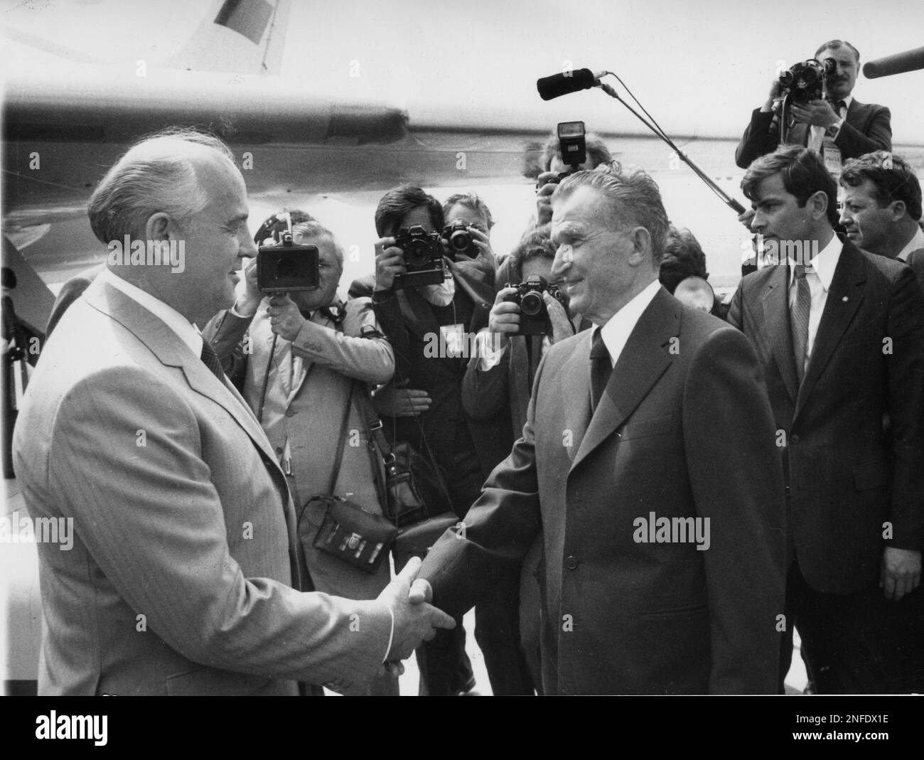 Romania's President Nicolae Ceausescu, right, welcomes the Soviet Union ...