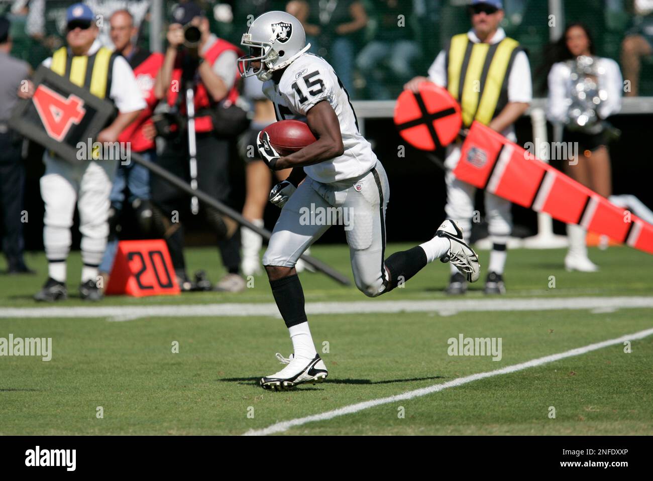 Oakland Raiders' Johnnie Lee Higgins runs for yardage during an NFL ...