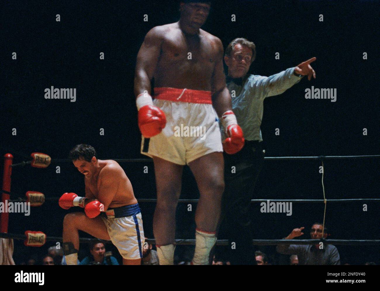 Former heavyweight champion George Foreman, center, is shown to his ...