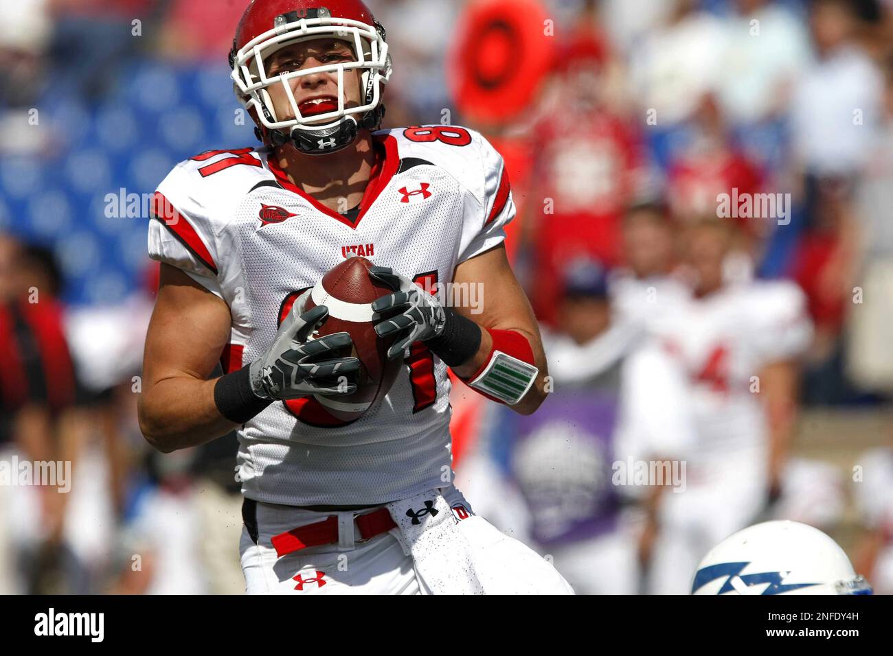 Utah wide receiver Bradon Godfrey, 81, carries the ball against Air ...