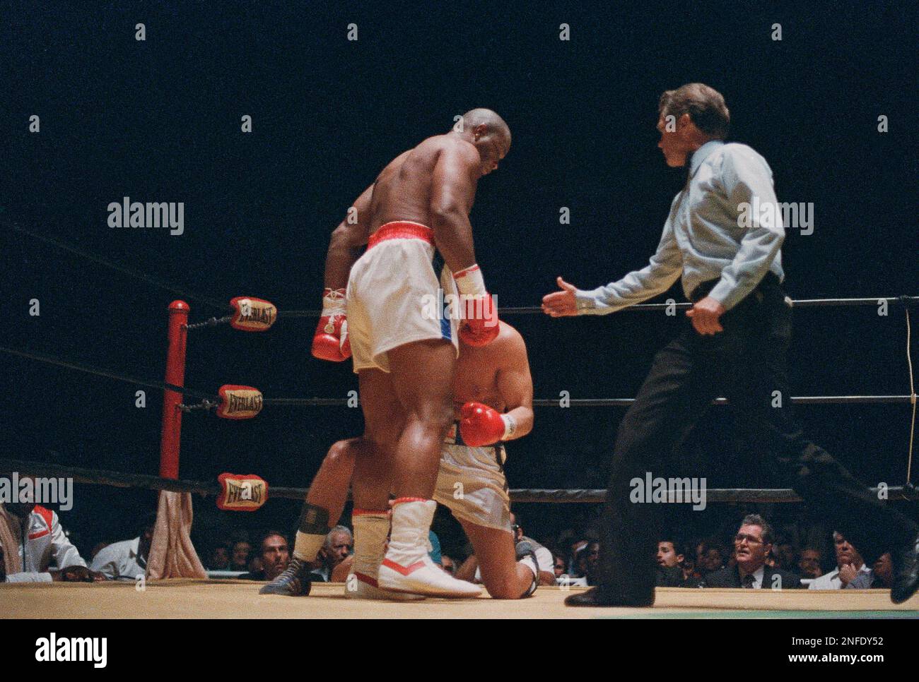 Former heavyweight champion George Foreman, left, and Charlie Hostetter ...