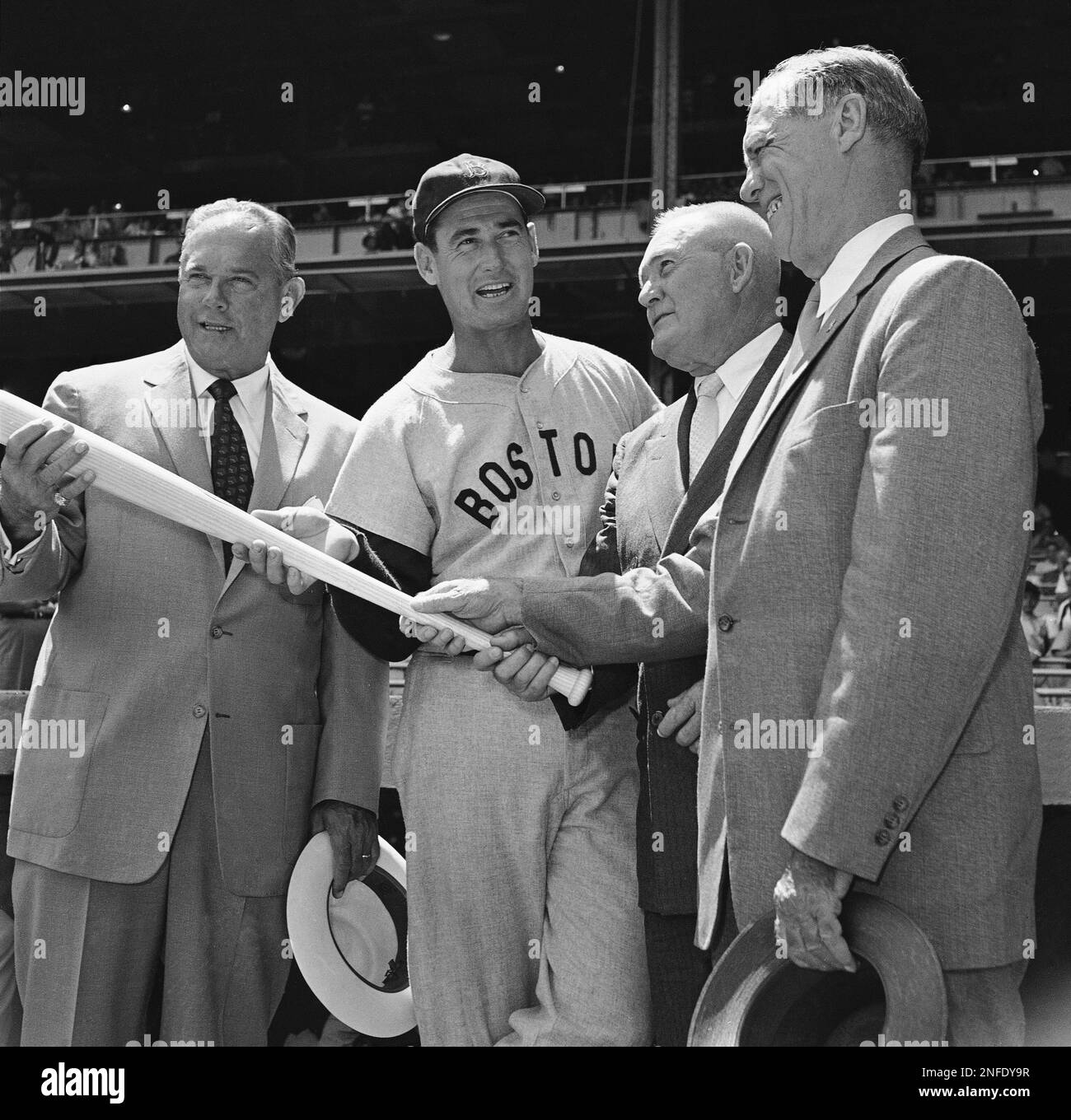 Boston's Ted Williams, second from left, is the only one of these ...