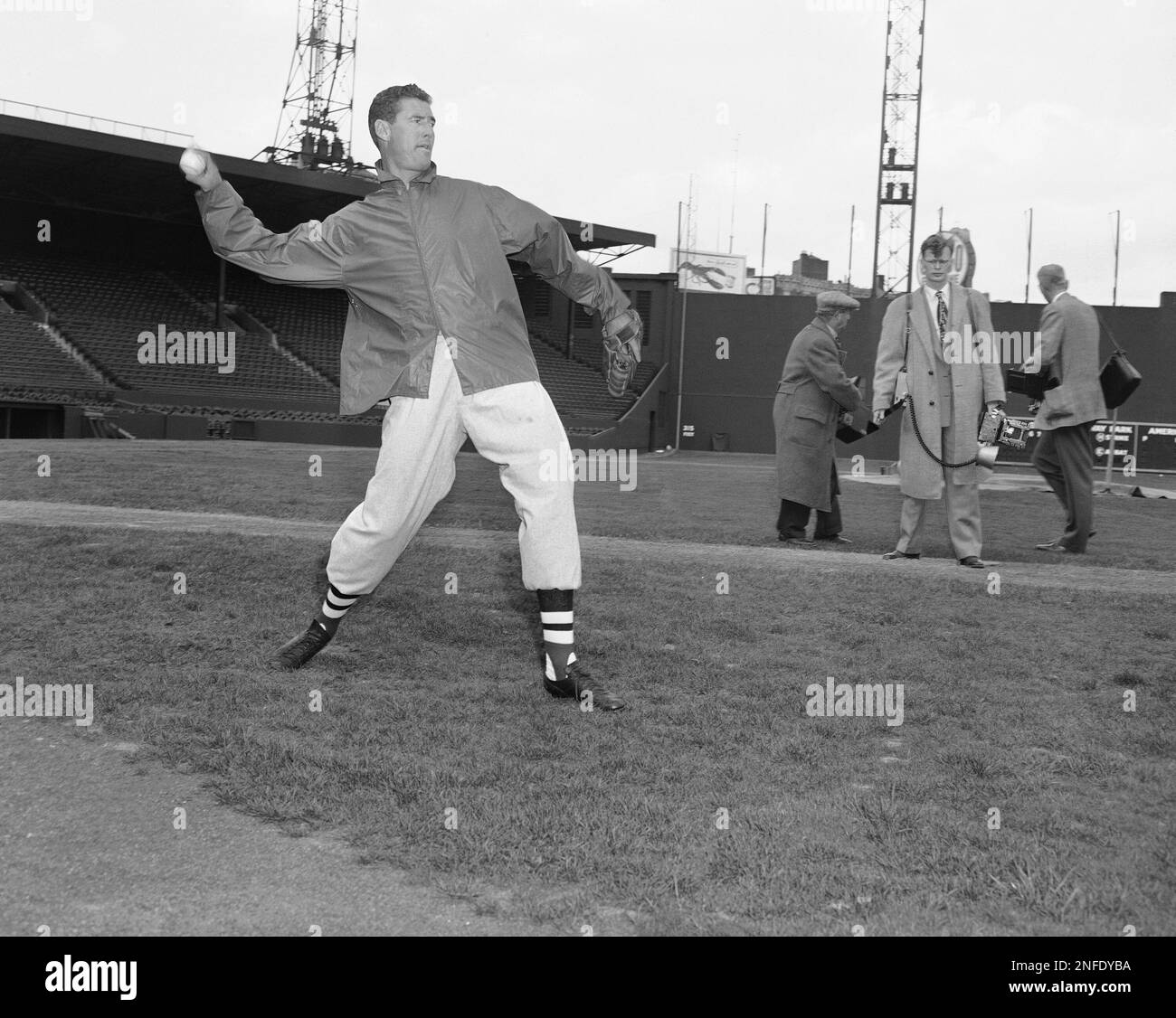 Ted Williams throws ball in a game of catch with a Fenway Park employee ...