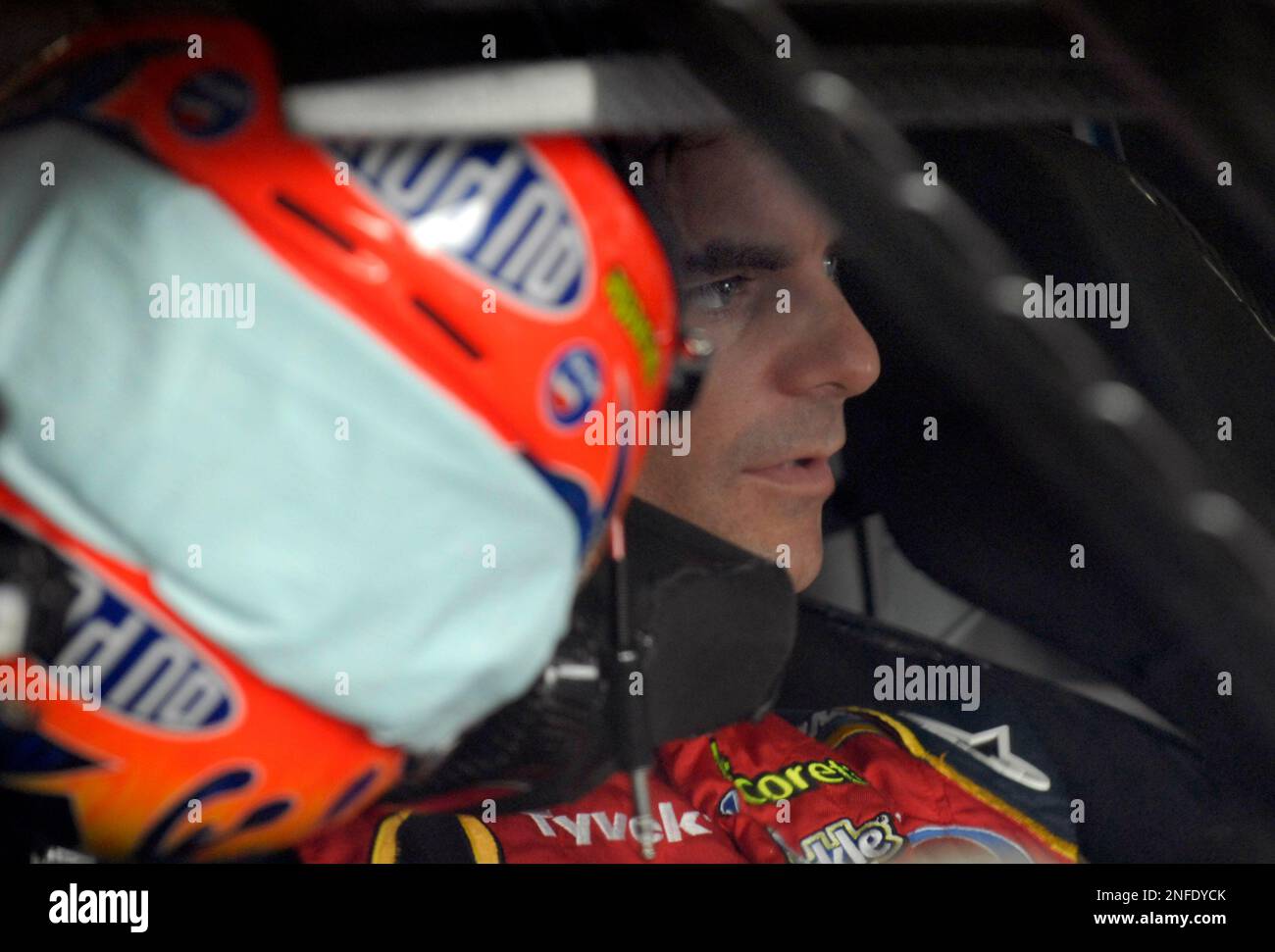 **FOR USE WITH AUTO RACING PACKAGE**Jeff Gordon looks from his car ...