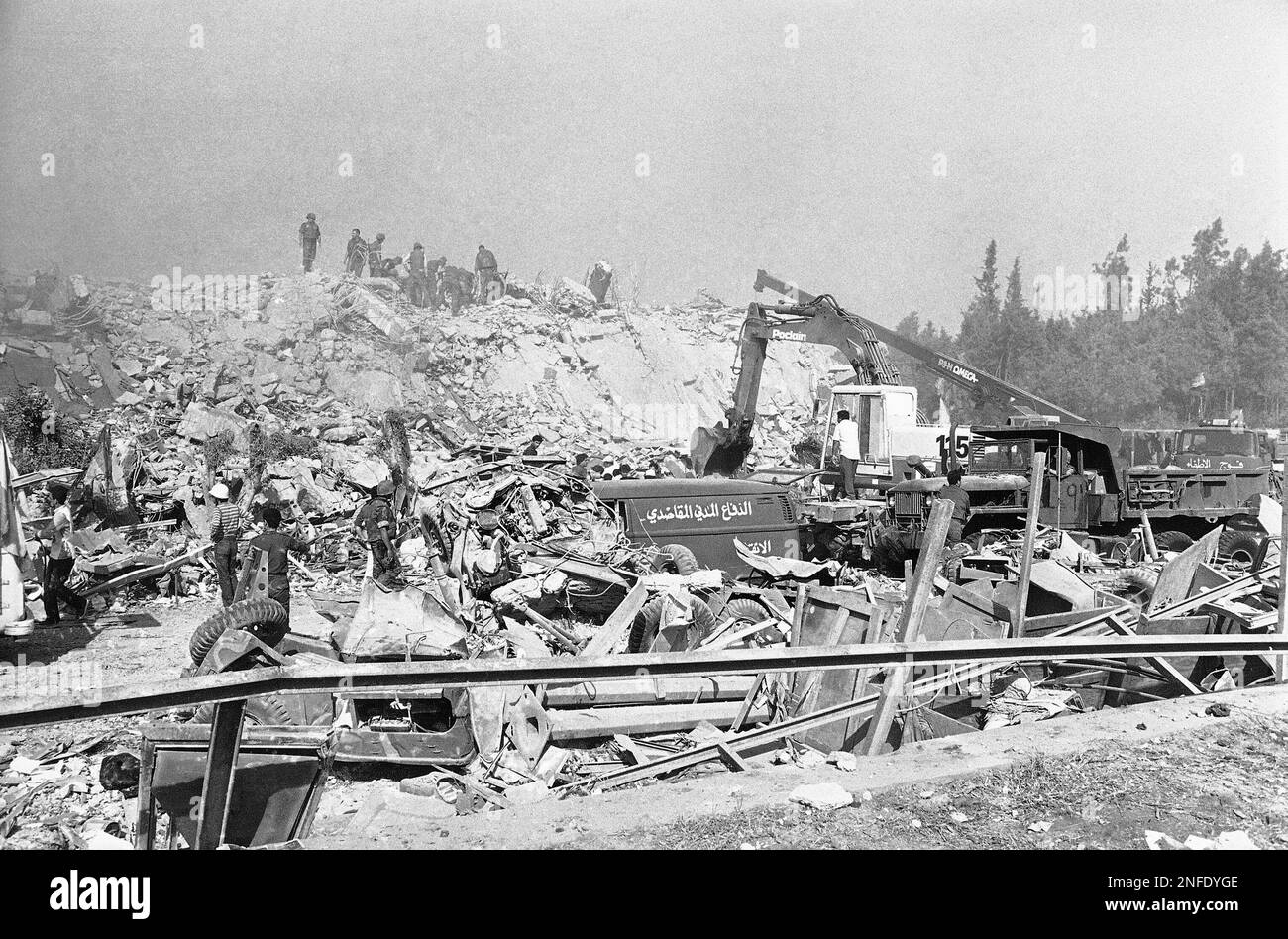 Rescuers probe the ruins of the U.S. Marines command post near Beirut ...
