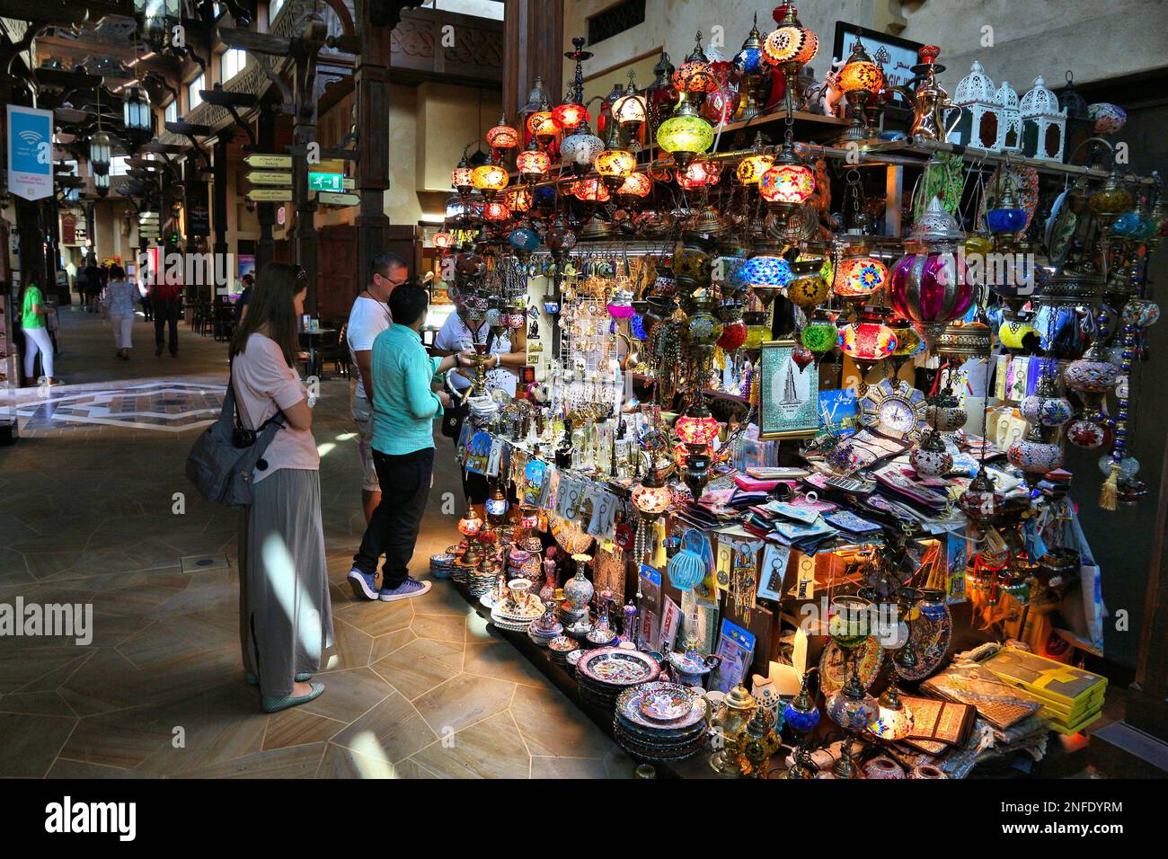 DUBAI, UAE - NOVEMBER 23, 2017: Tourists visit local handicraft shops ...