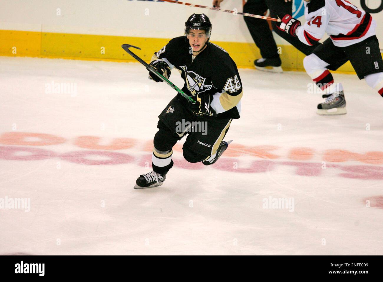 Pittsburgh Penguins' Tyler Kennedy skates against the New Jersey Devils ...