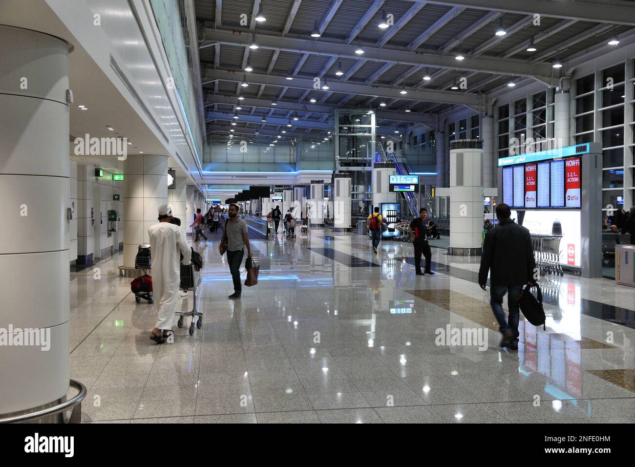 DUBAI, UAE - NOVEMBER 23, 2017: Passengers visit Dubai International ...