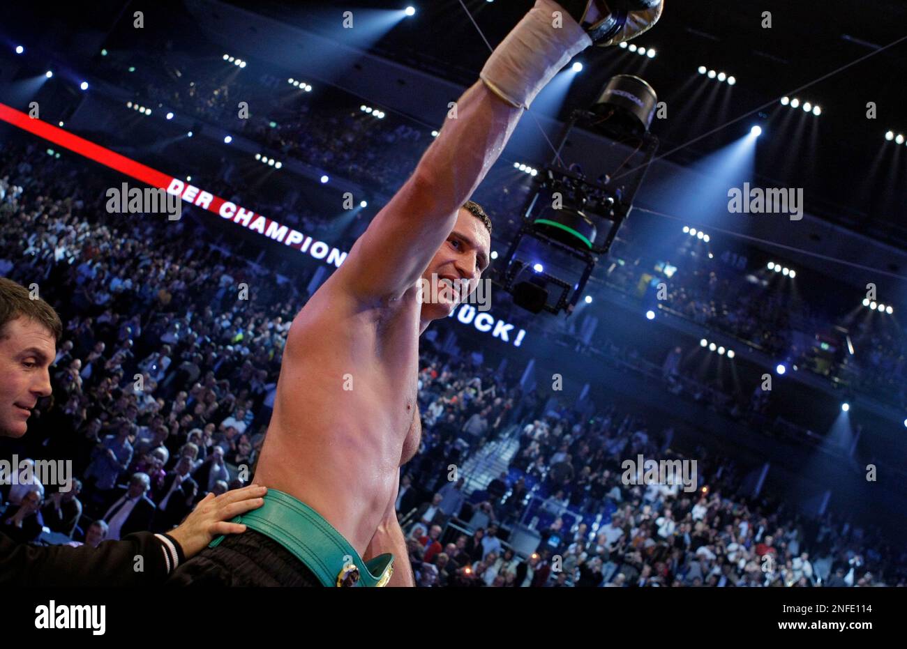 Vitali Klitschko celebrates after defeating Samuel Peter for the WBC ...