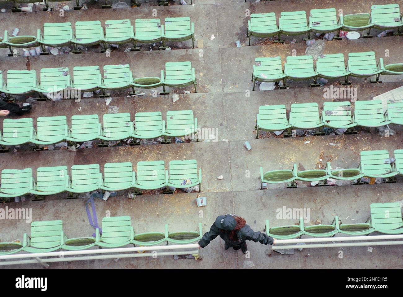 A security guard stands watch over an empty section at Comiskey Park ...