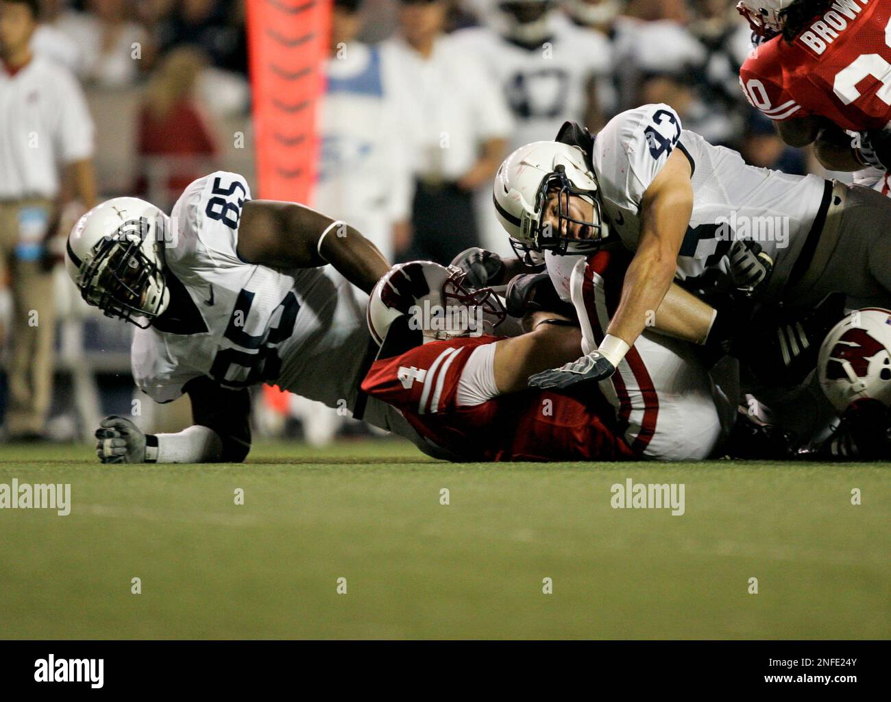Penn State's Ollie Ogbu (85) and Josh Hull (43) sack Wisconsin ...