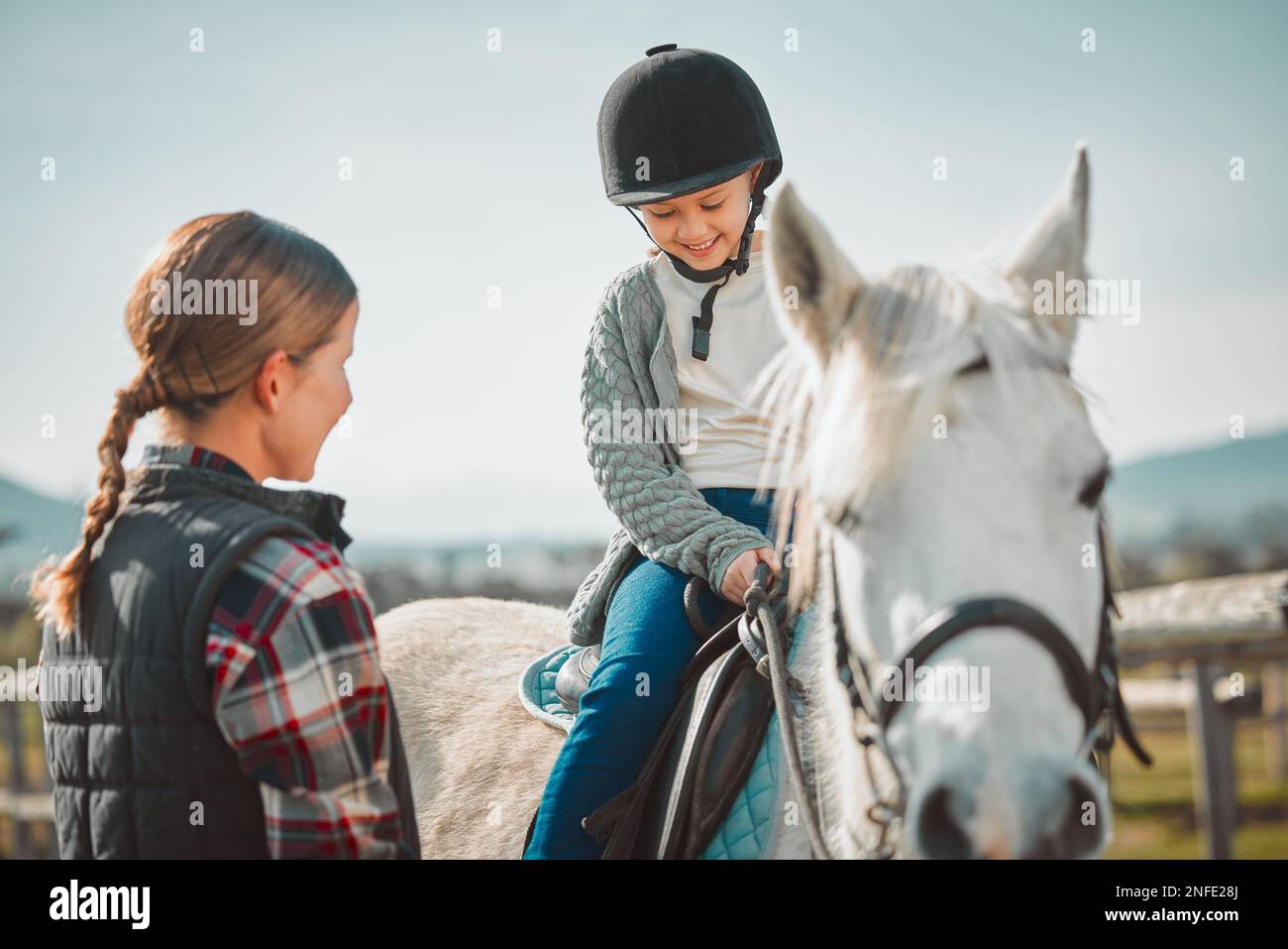 Learning, hobby and girl on a horse with a woman for fun activity in ...