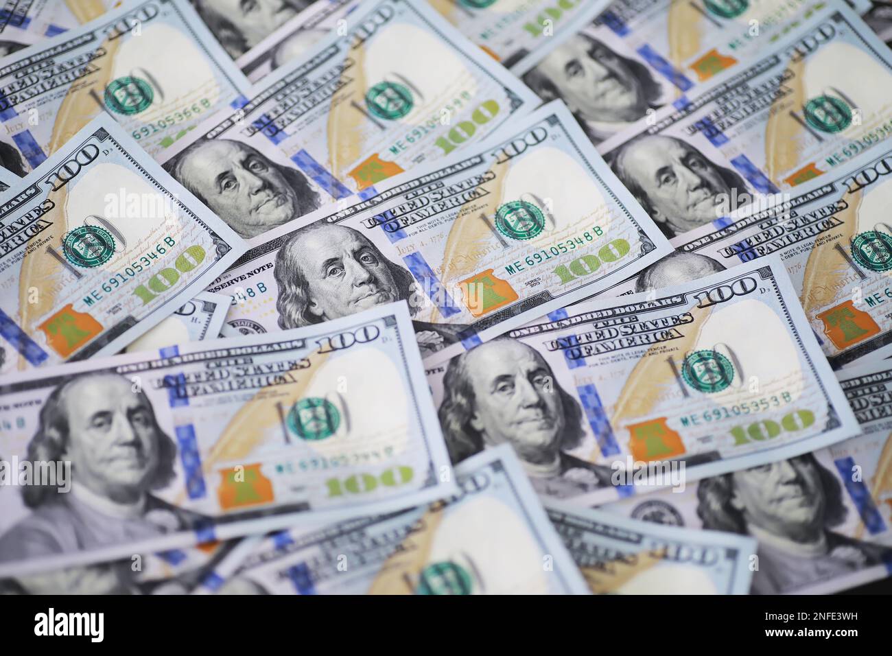 Cash money in a large pile as a finance background. Paper money close ...