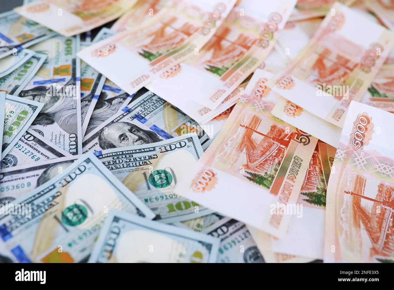 Cash money in a large pile as a finance background. Paper money close ...