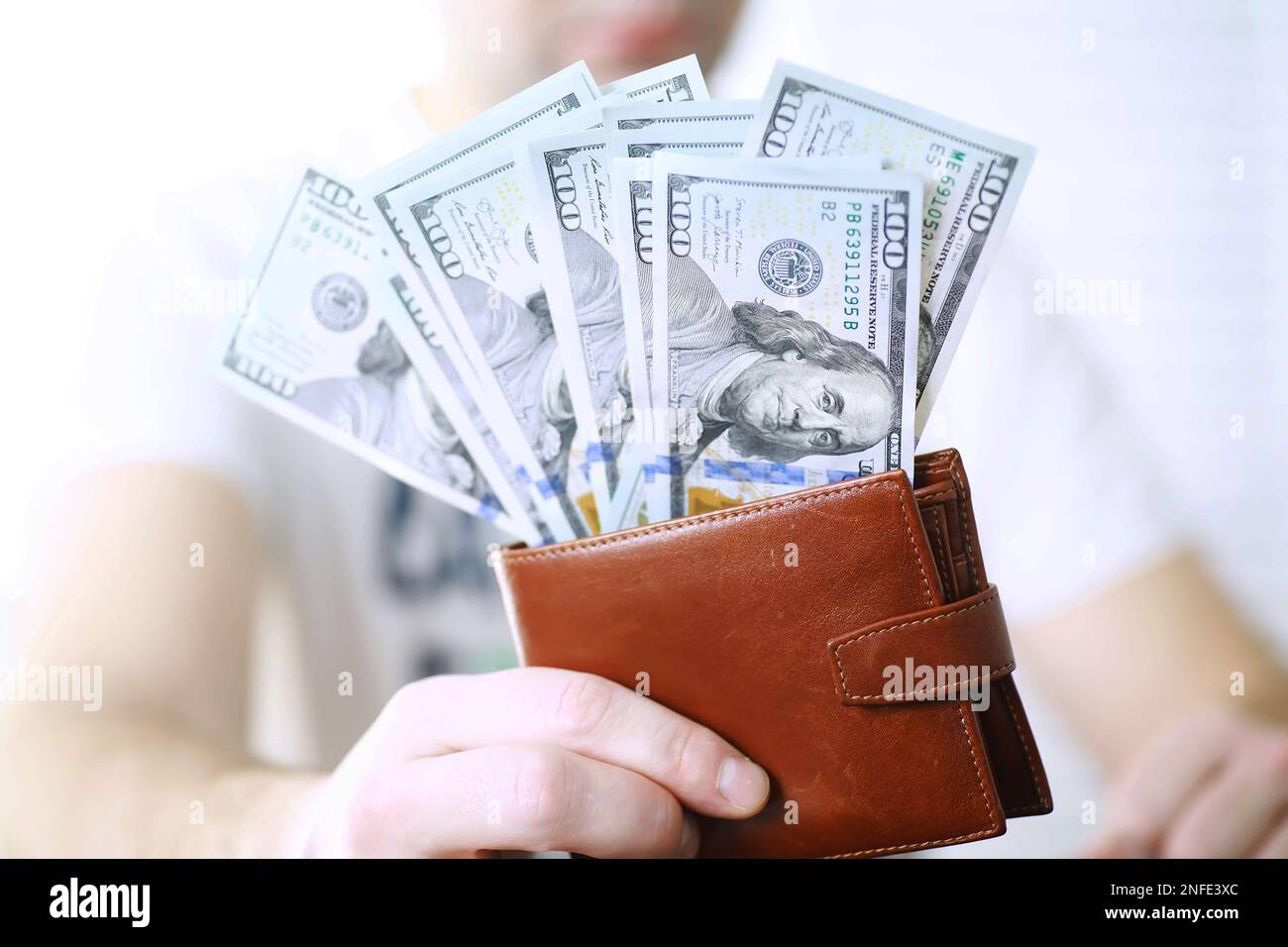 Cash money in a large pile as a finance background. Paper money close ...
