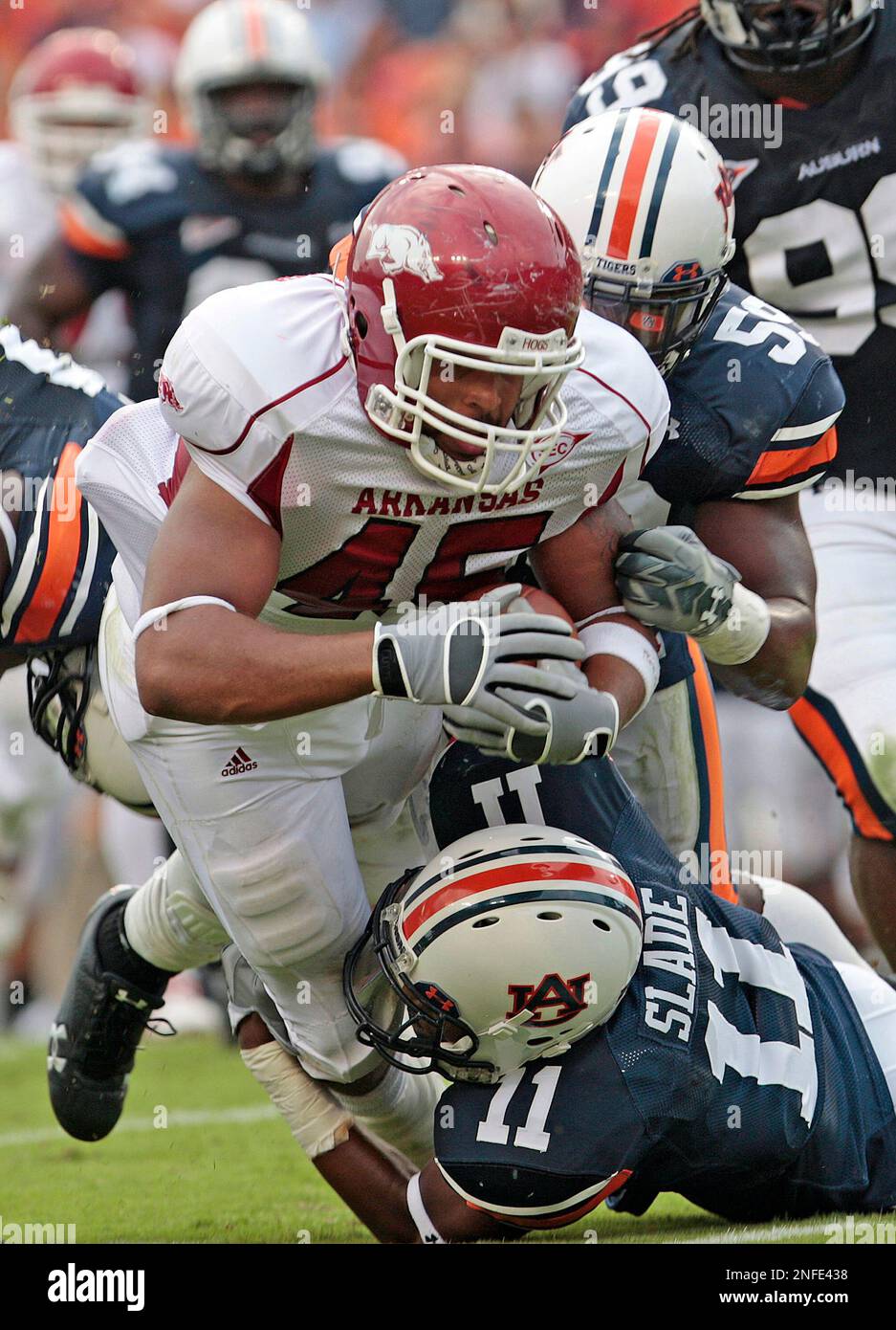 Arkansas tight end D.J. Williams (45) runs for yardage as Auburn's Mike ...